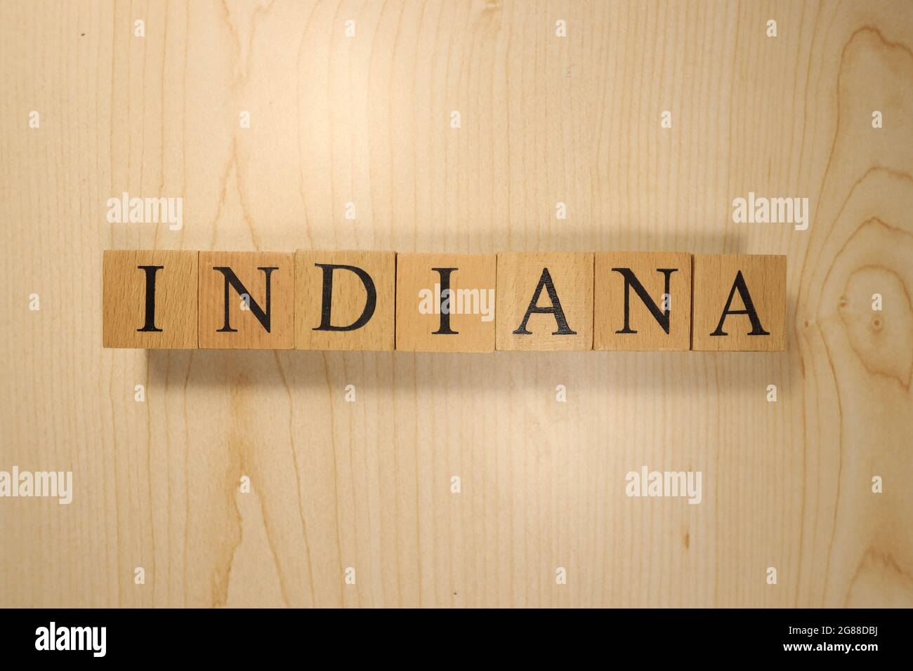 The word Indiana was created from wooden letter cubes. Cities and words ...