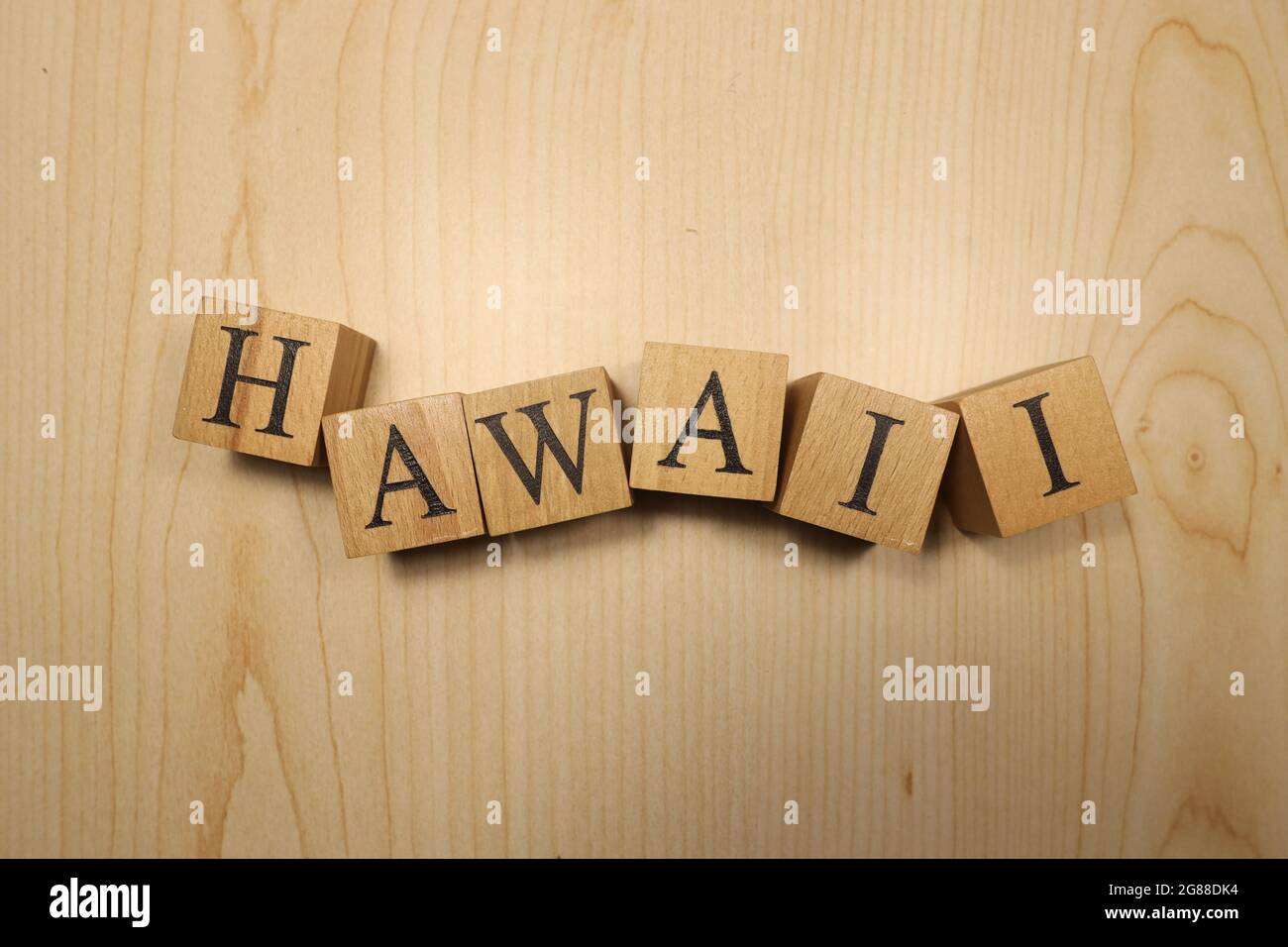 Hawaii word created from wooden letter cubes. Cities and words. close ...