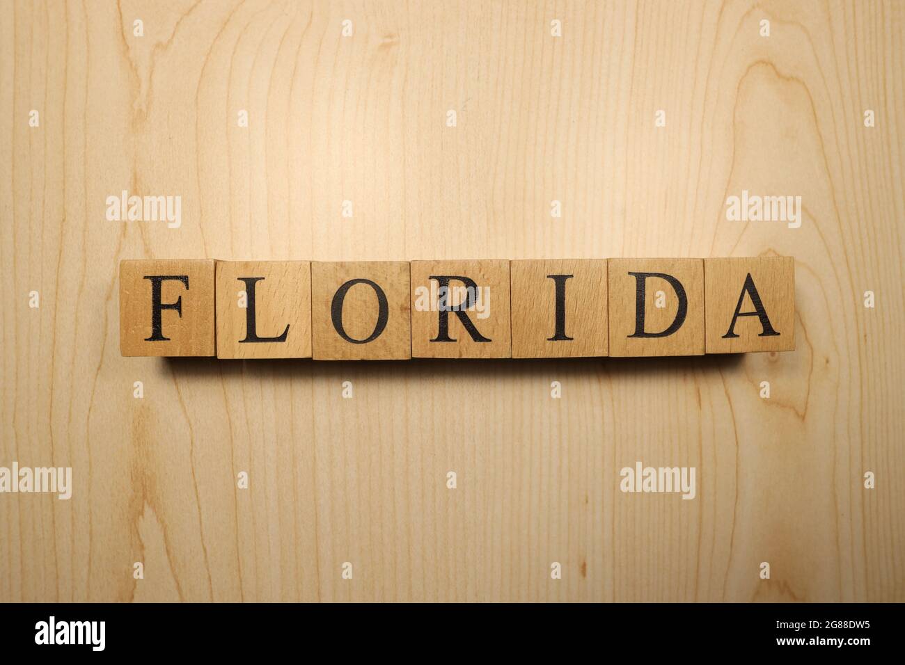 The word Florida was created from wooden letter cubes. Cities and words ...
