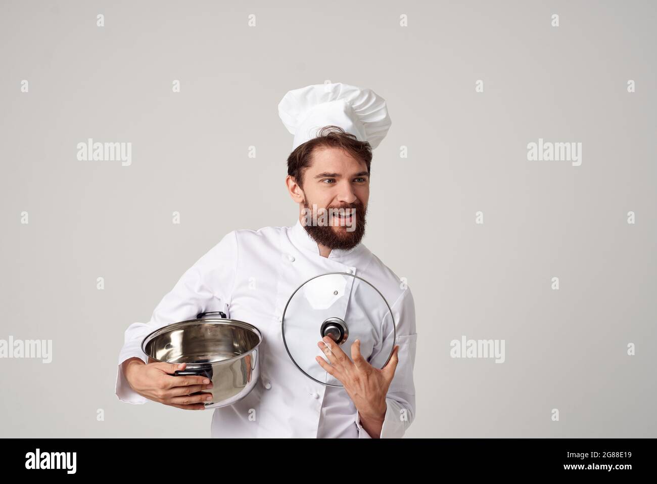 professional chef with a pot in his hands kitchen service profession ...