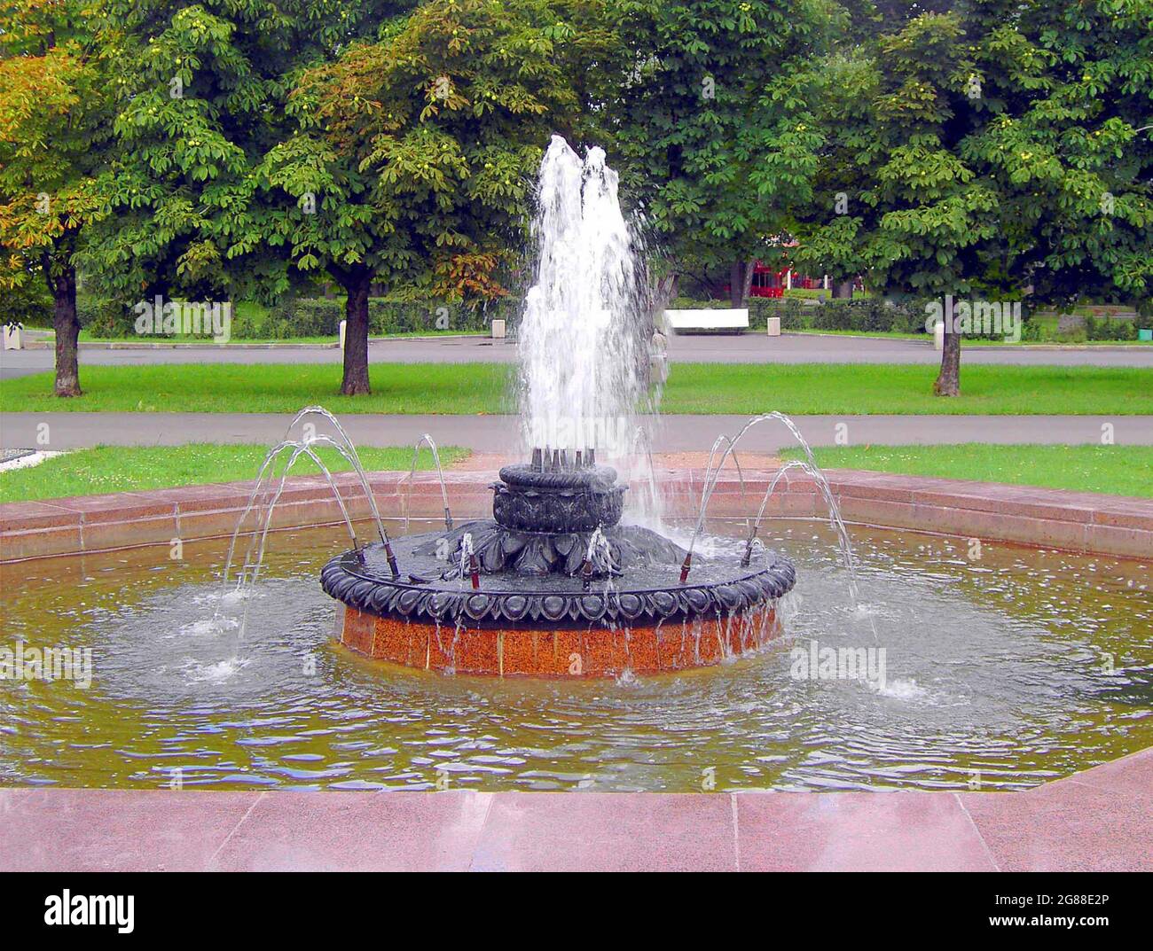 fountain in city park at summer Stock Photo - Alamy