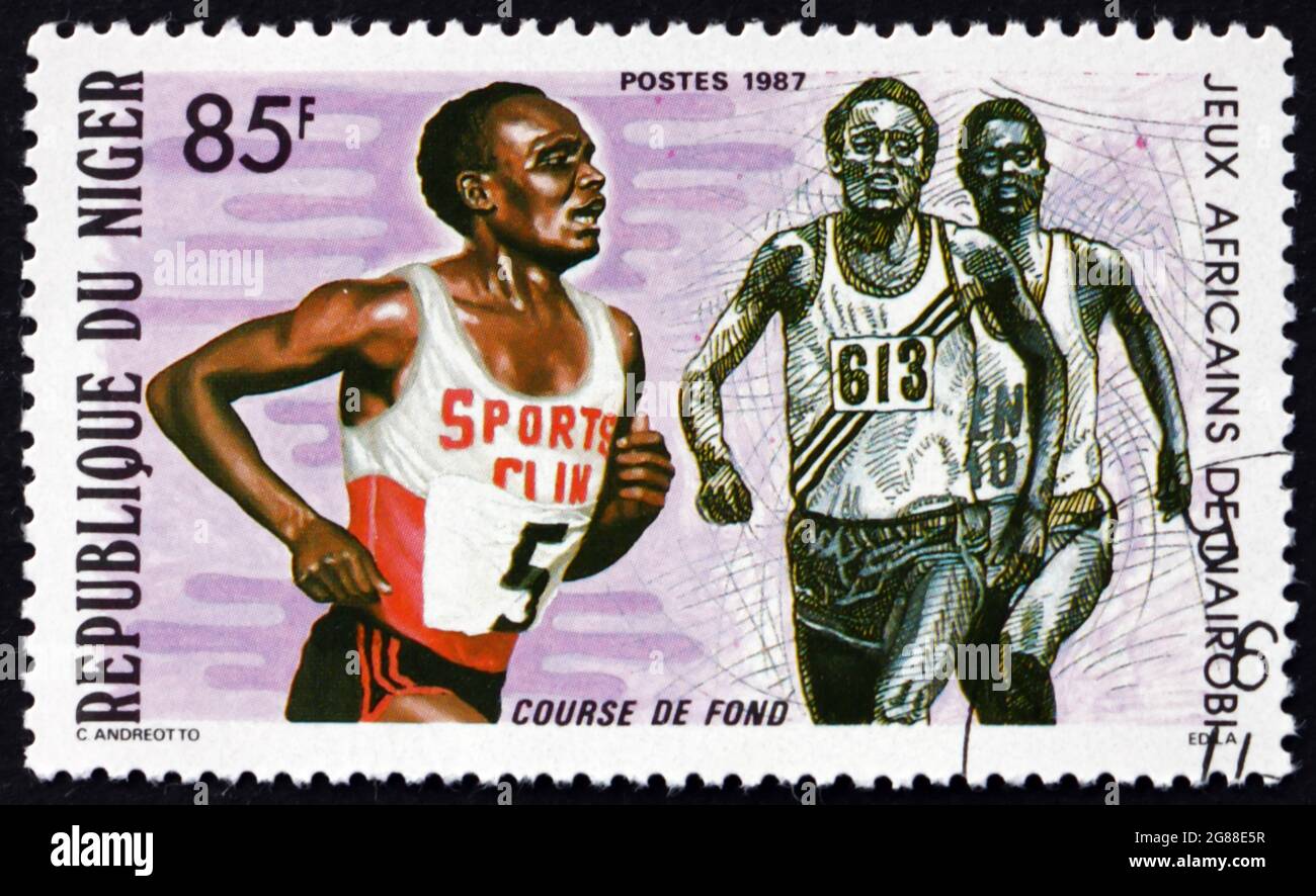 NIGER - CIRCA 1987: a stamp printed in Niger shows Runners, African ...