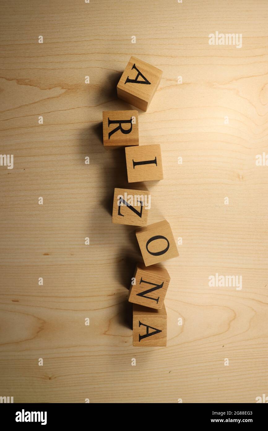 The word Arizona was created from wooden letter cubes. Cities and words ...