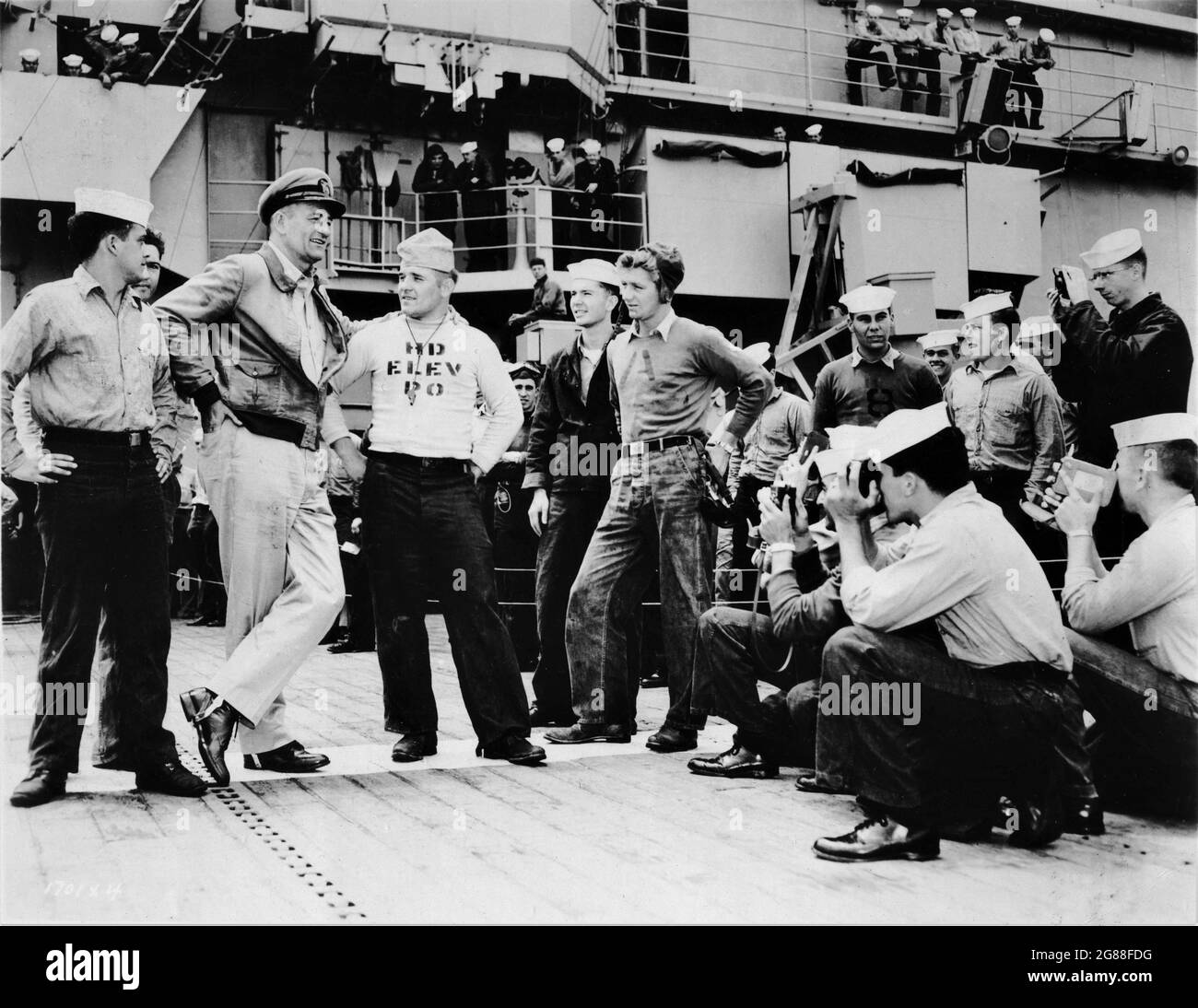 JOHN WAYNE on set location candid with Sailors taking photos of him on ...