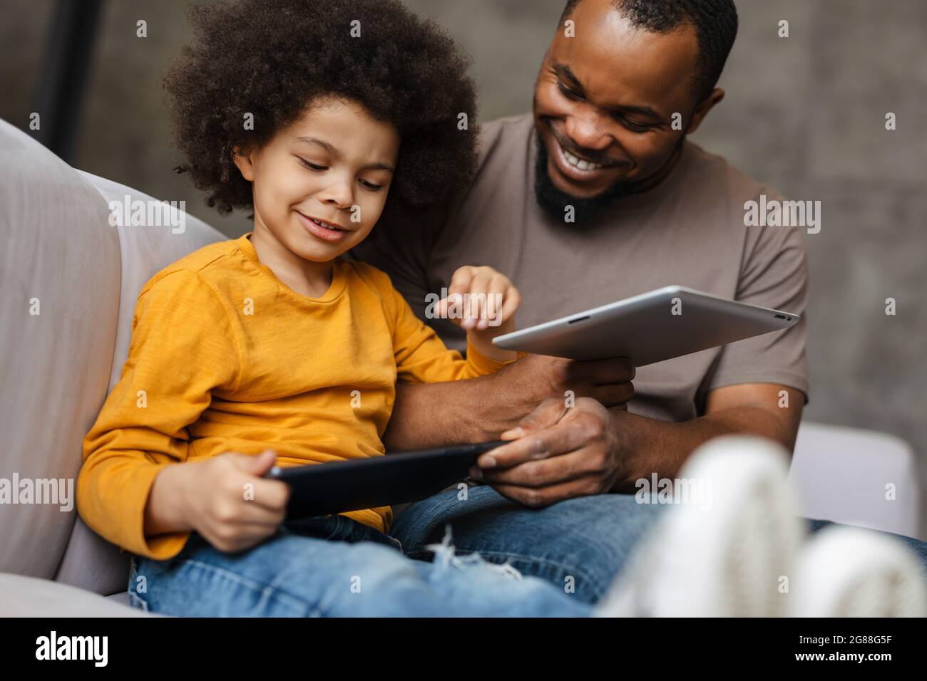 Father son using computers hi-res stock photography and images - Alamy