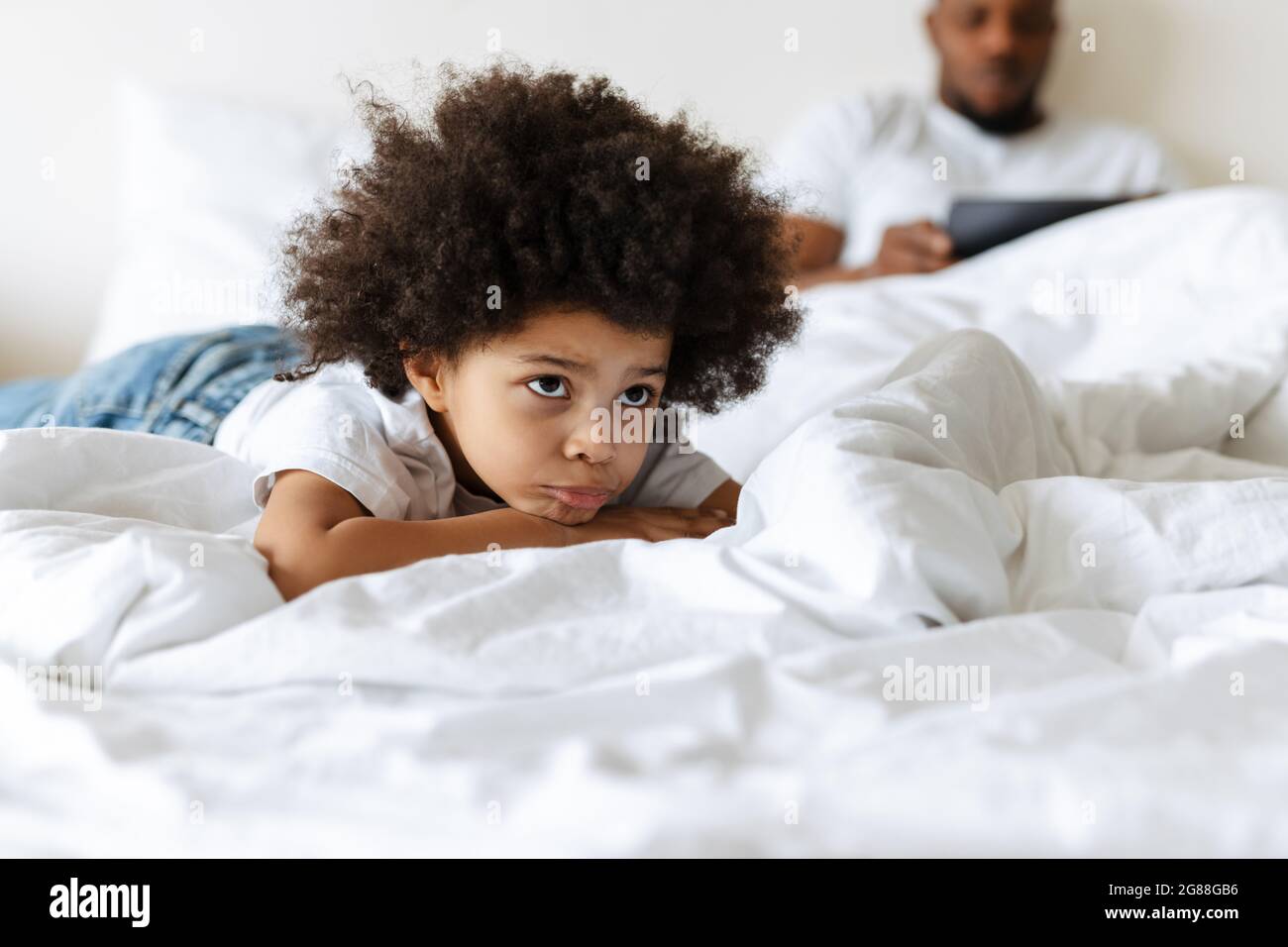 Child sad using computer home hi-res stock photography and images - Alamy