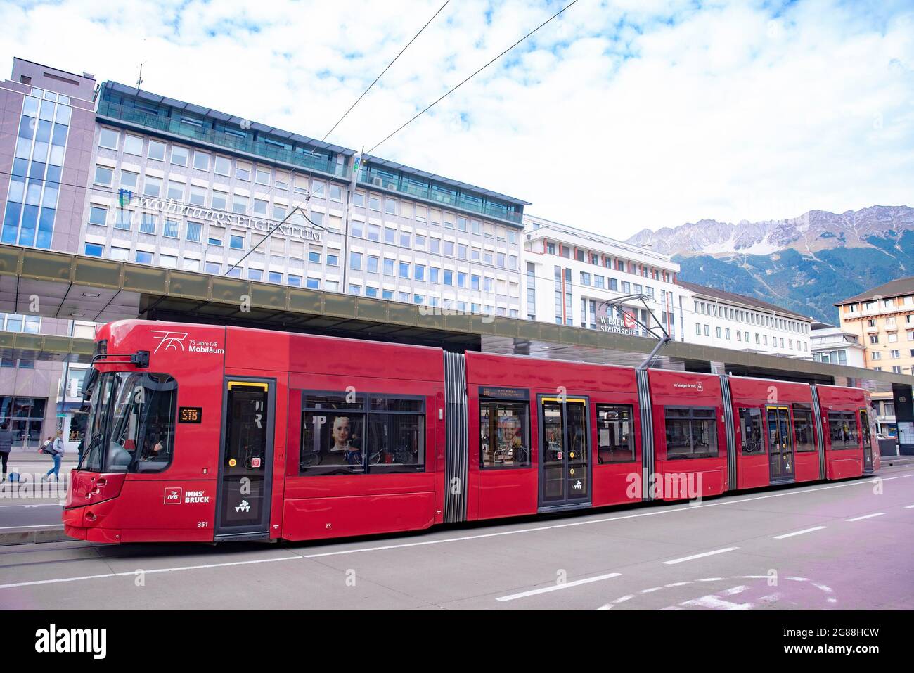 View of Red Tram in Innsbruck city centre. Taken in Innsbruck, Austria ...