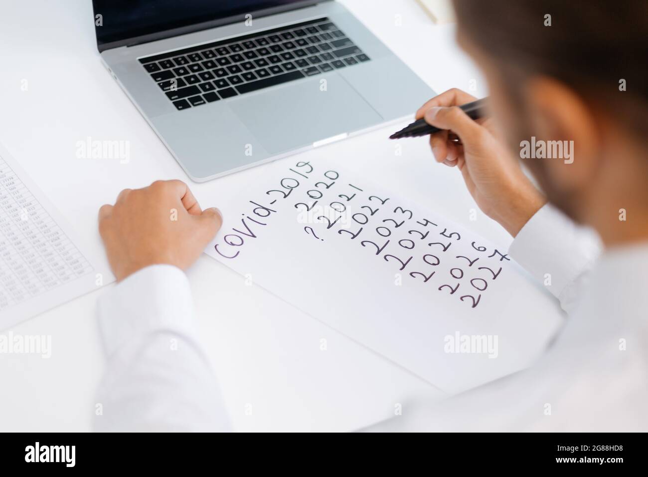 business man predicting the consequences of the pandemic Stock Photo ...