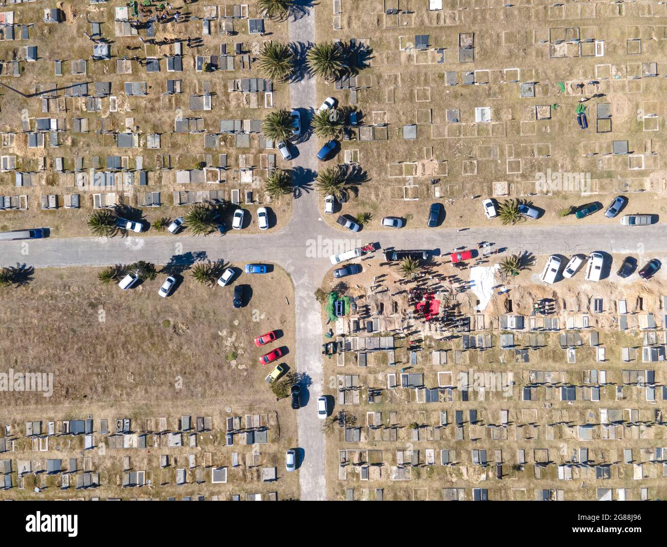 Drone view of graveyard with people seen Stock Photo - Alamy