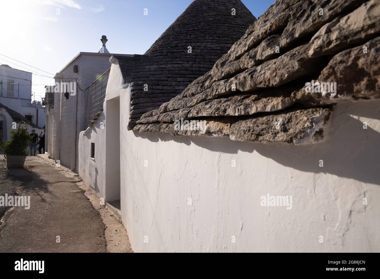 Beautiful town of Alberobello with typical trulli houses built from ...