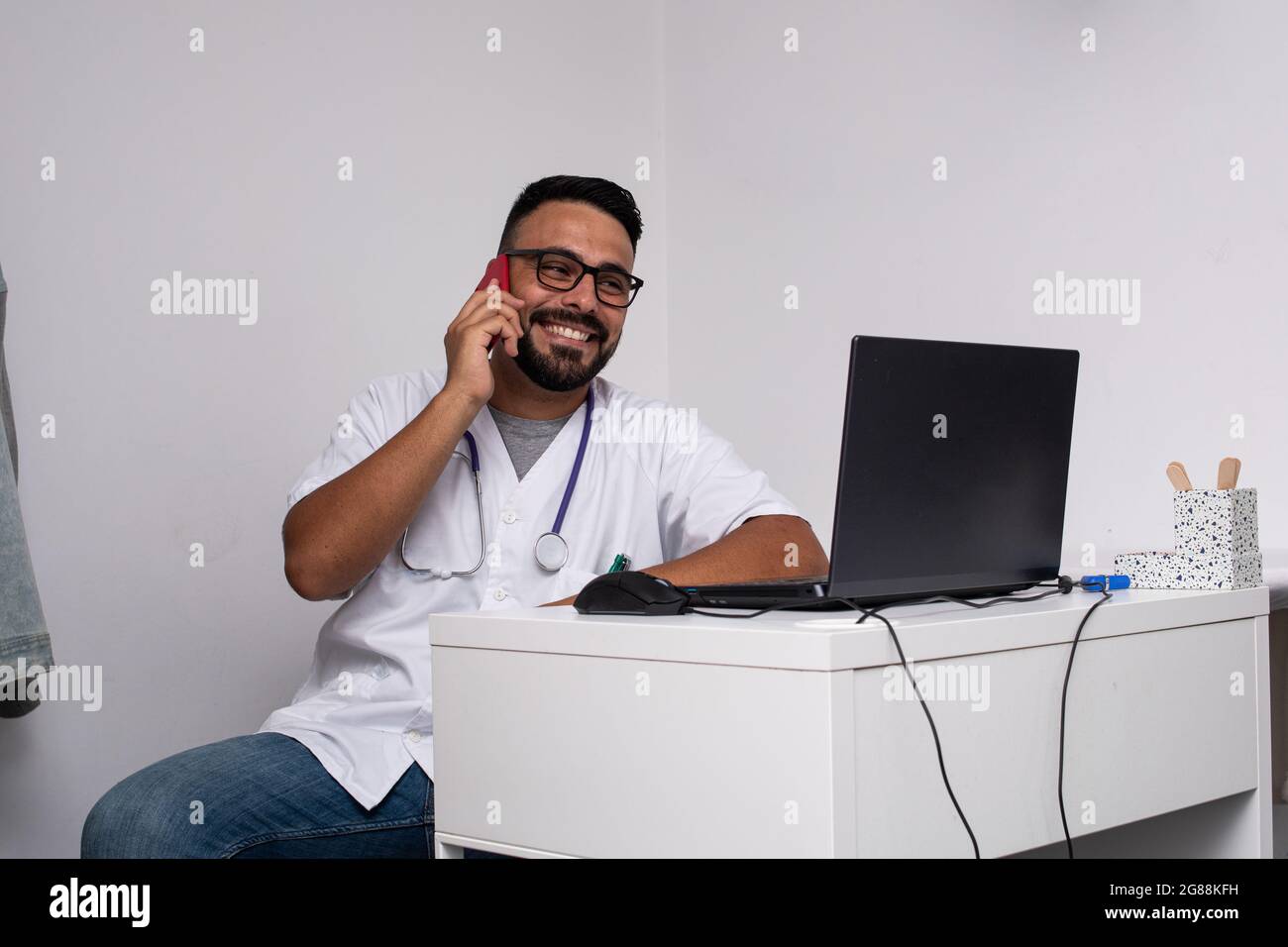 Doctor making a call hi-res stock photography and images - Alamy