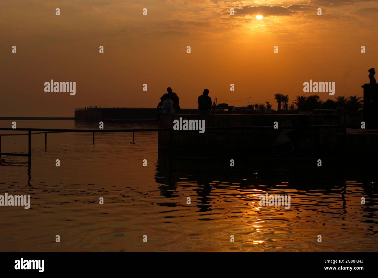 water and beautiful sunset in river Stock Photo - Alamy