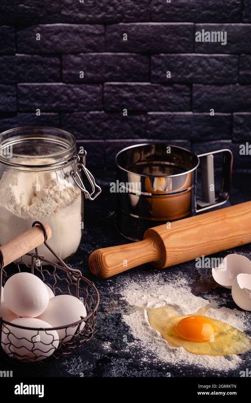 Table with baking products and tools. Culinary, baking concept Stock ...