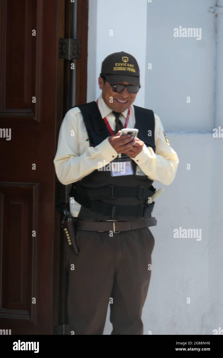Police guard with gun in Arequipa Peru Stock Photo - Alamy