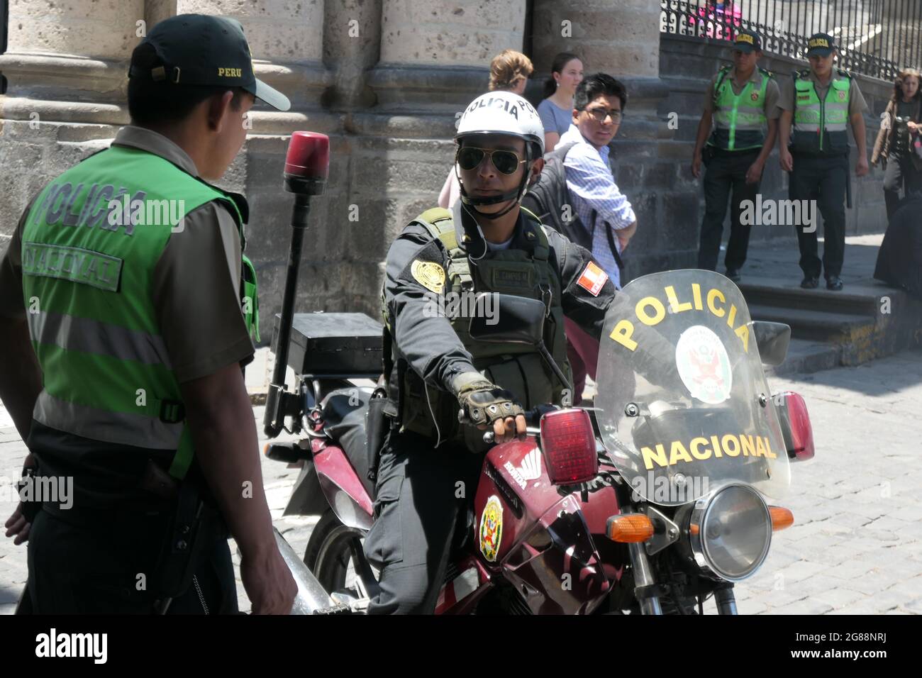 Policemen with a motorbike in Arequipa Peru Stock Photo - Alamy
