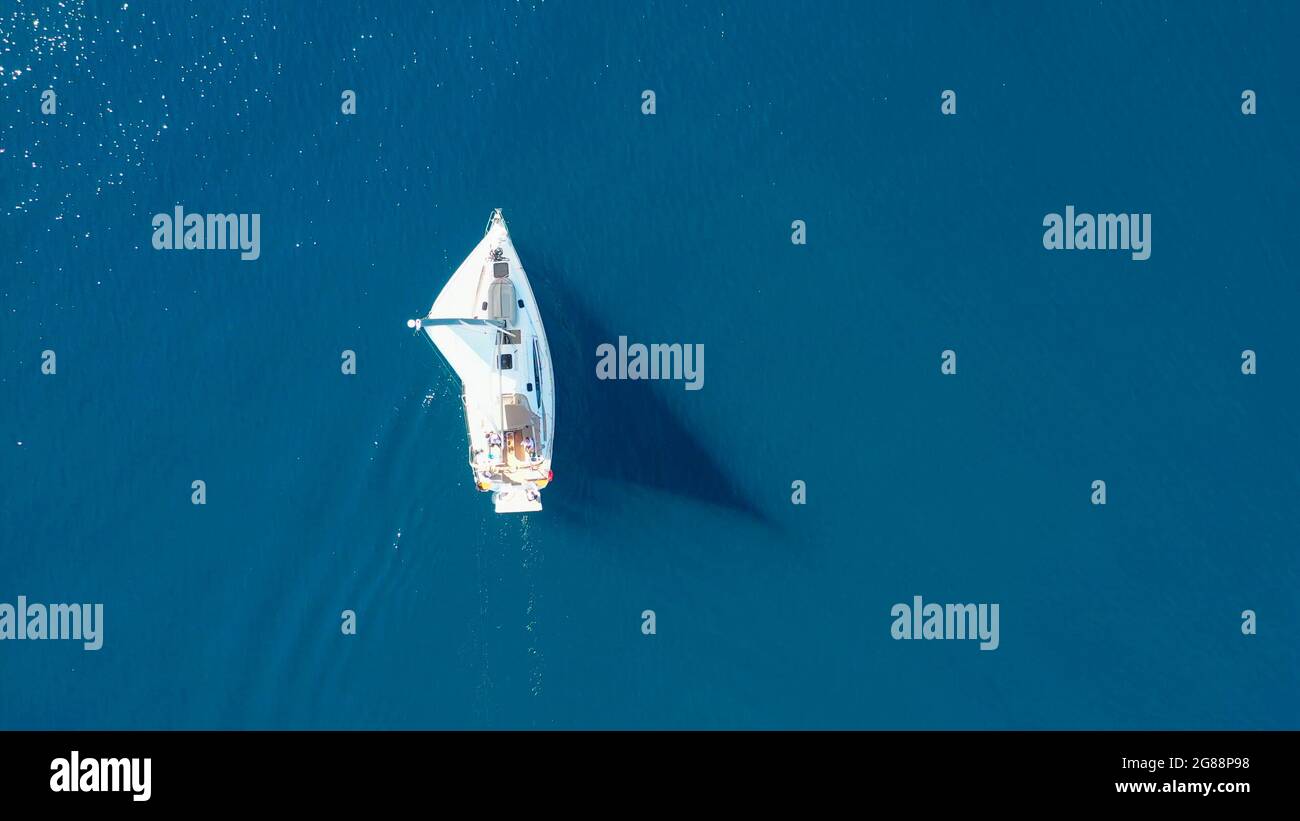 Top view of sailing luxury yacht at opened sea at sunny day in Croatia ...