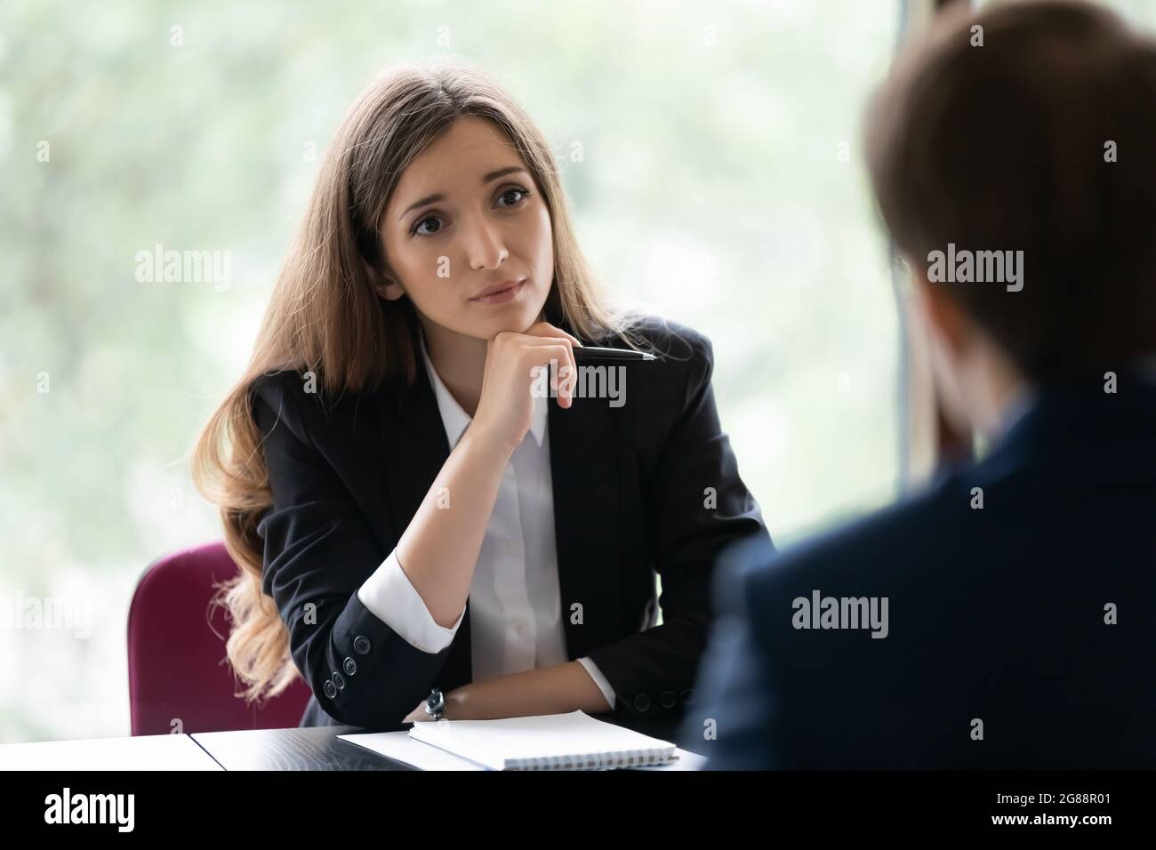 Young female at job interview hi-res stock photography and images - Alamy