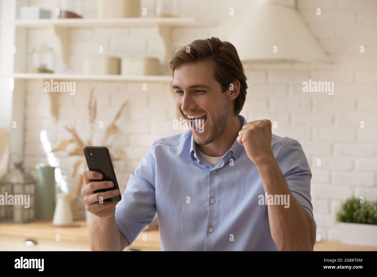 Happy smart business man celebrate hi-res stock photography and images ...