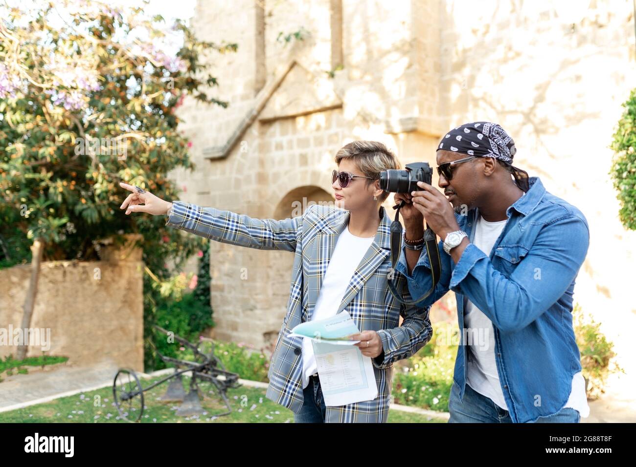 Multicultural african and latin couple enjoing traveling together ...