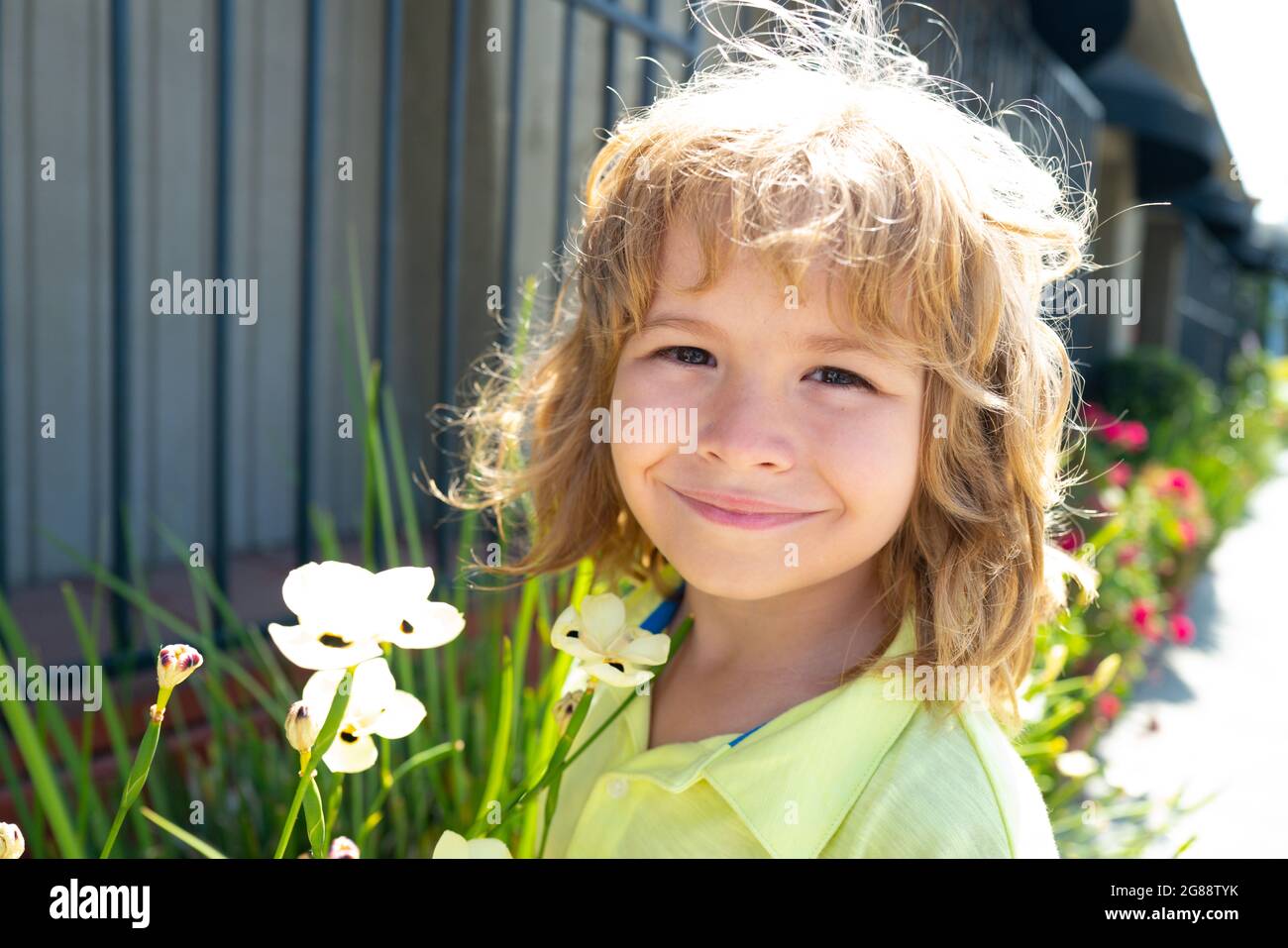 Kids funny face. Happy kid having fun and making faces outdoors ...