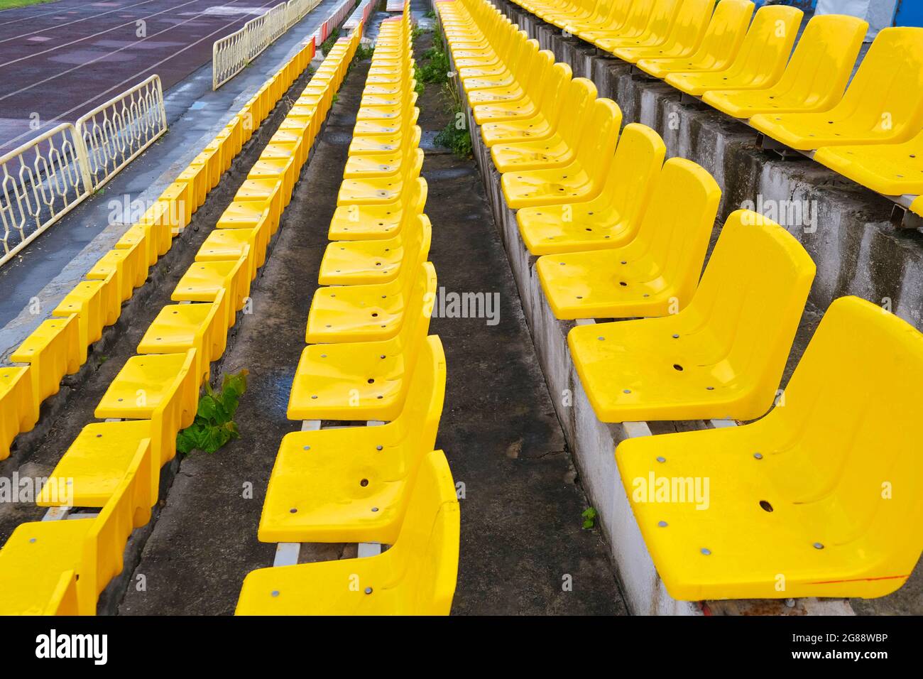 Bright yellow football stadium seats. Horizontal shot Stock Photo - Alamy