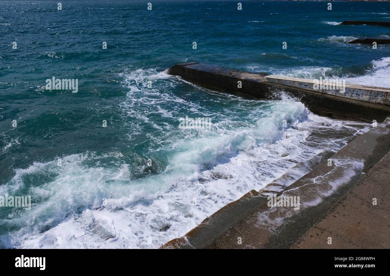 Amazing sea wave on the black sand coastline Stock Photo - Alamy