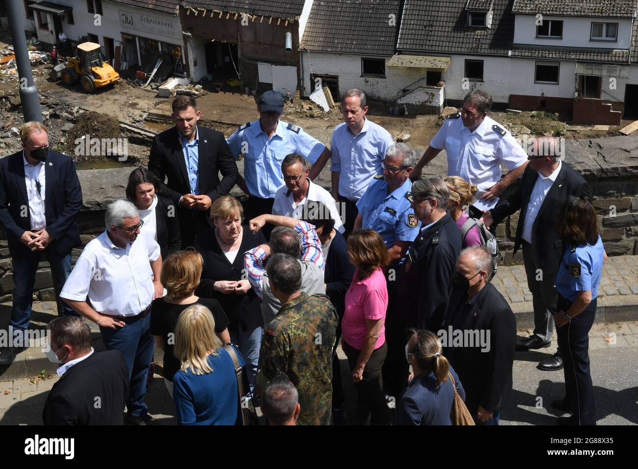 Schuld, Germany. 18th July, 2021. Chancellor Angela Merkel (centre) and ...