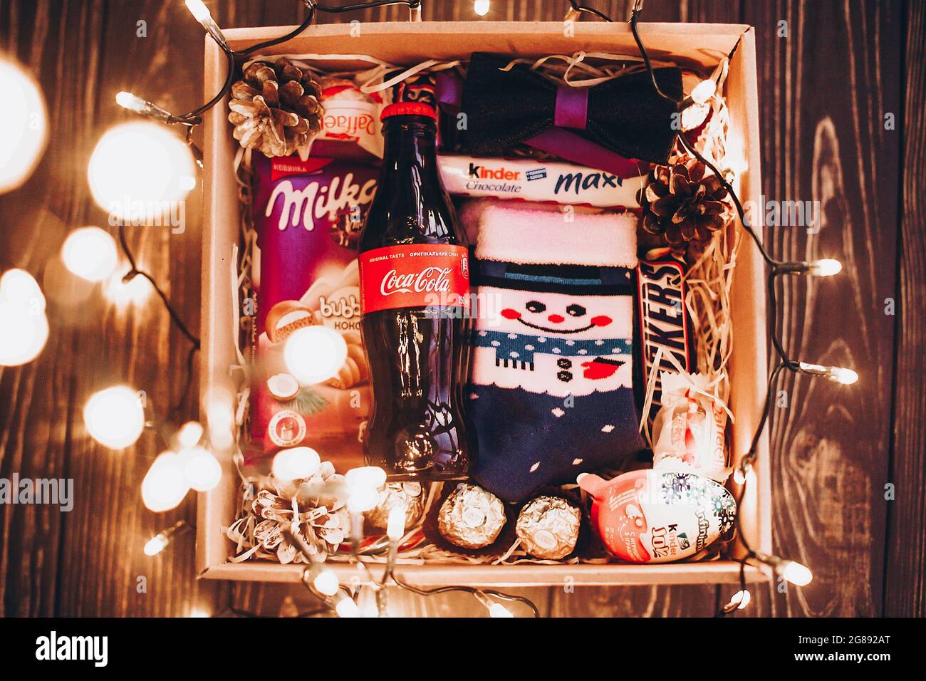 Lviv, Ukraine - December 1, 2017: Stylish socks,bow tie, coca cola ...