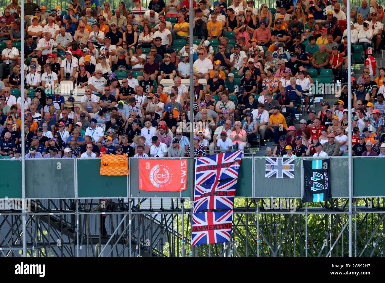 Spectators hang up banners in support of Mercedes' Lewis Hamilton and ...