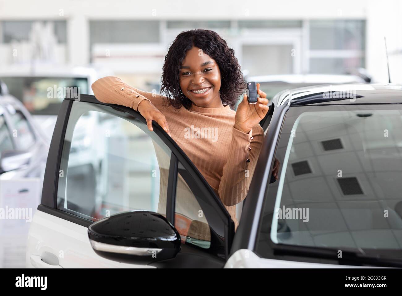 Happy African Woman Holding Keys To New Car And Smiling At Camera Stock ...