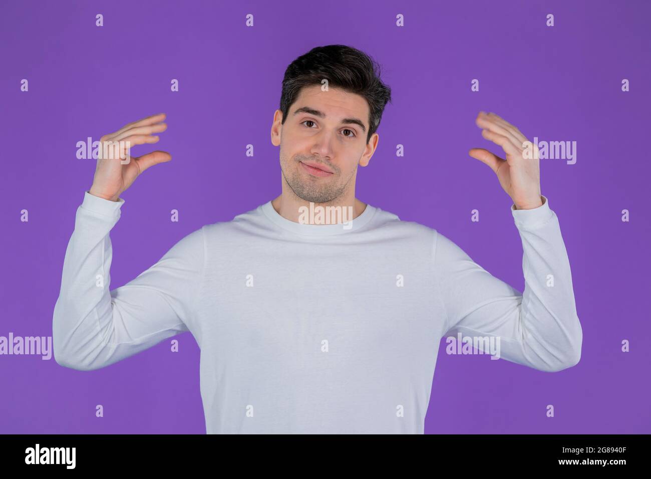 Handsome bored man showing bla-bla-bla gesture with hands and rolling ...