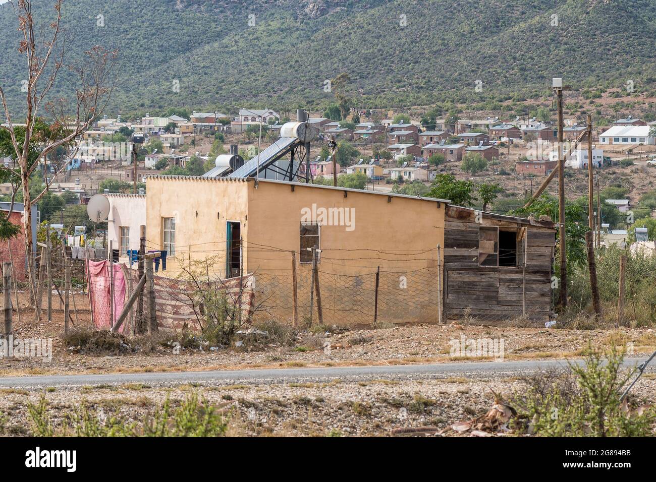 WILLOWMORE, SOUTH AFRICA - APRIL 21, 2021: A street scene in a township ...