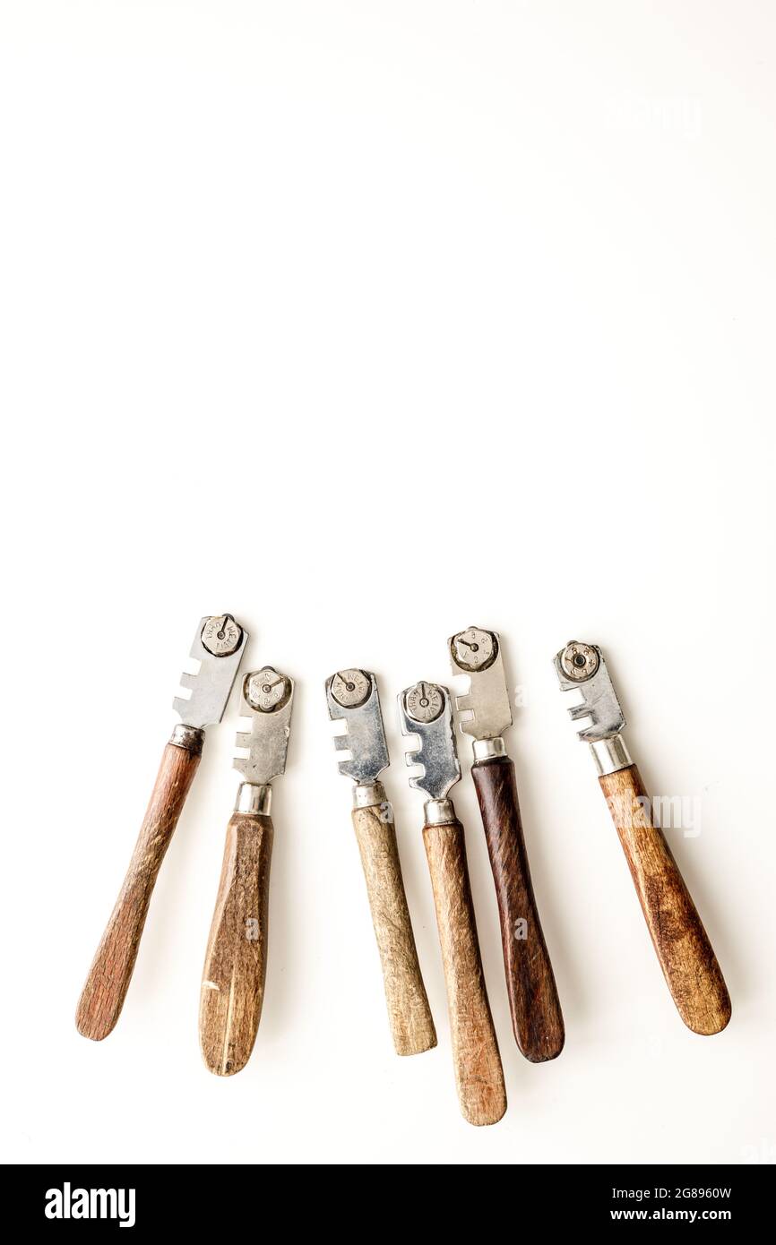 Old glass cutters on a white background, Special glazing tools Stock ...