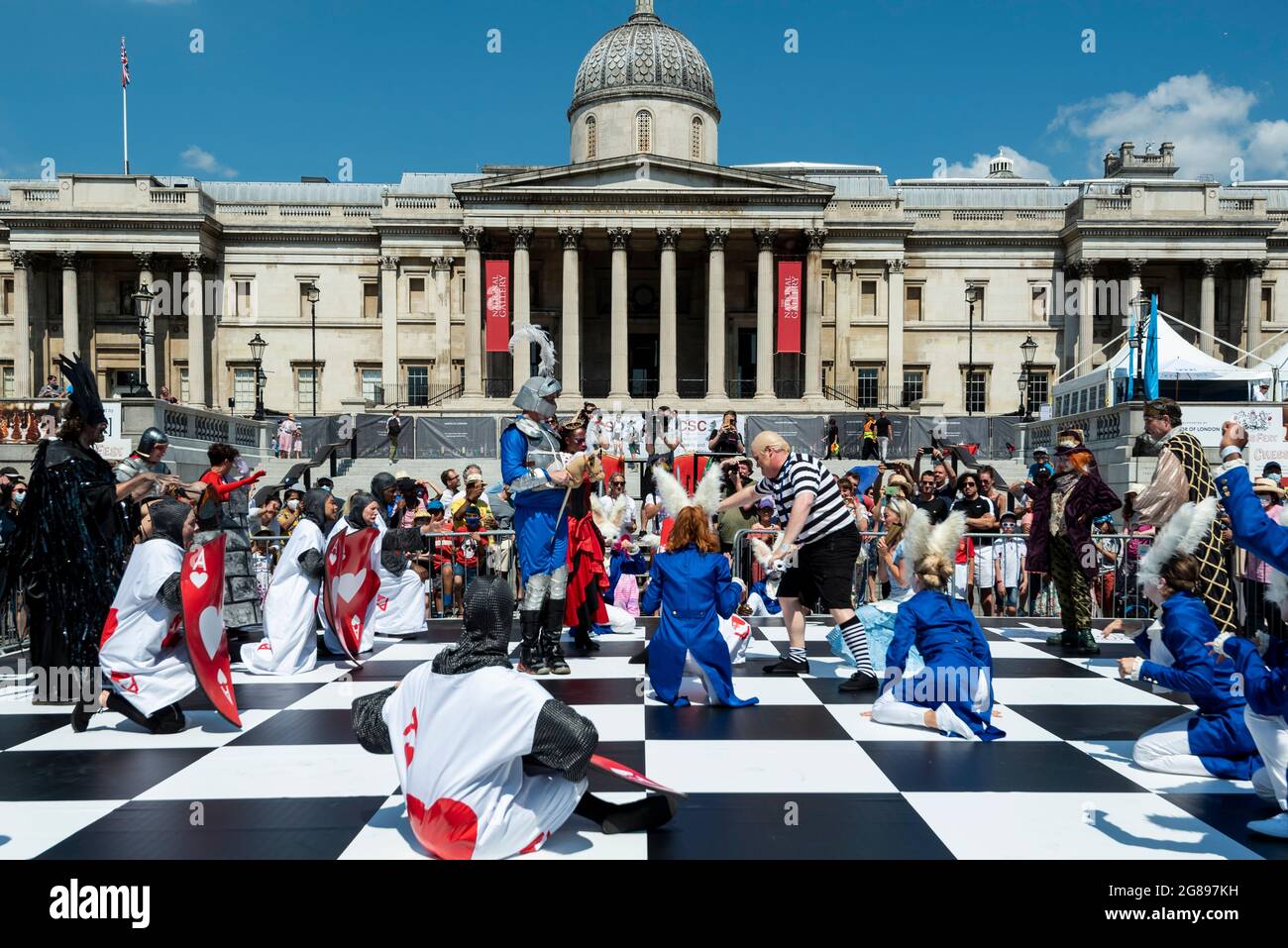 London, UK. 18 July 2021. Costumed actors take part in a game of human ...