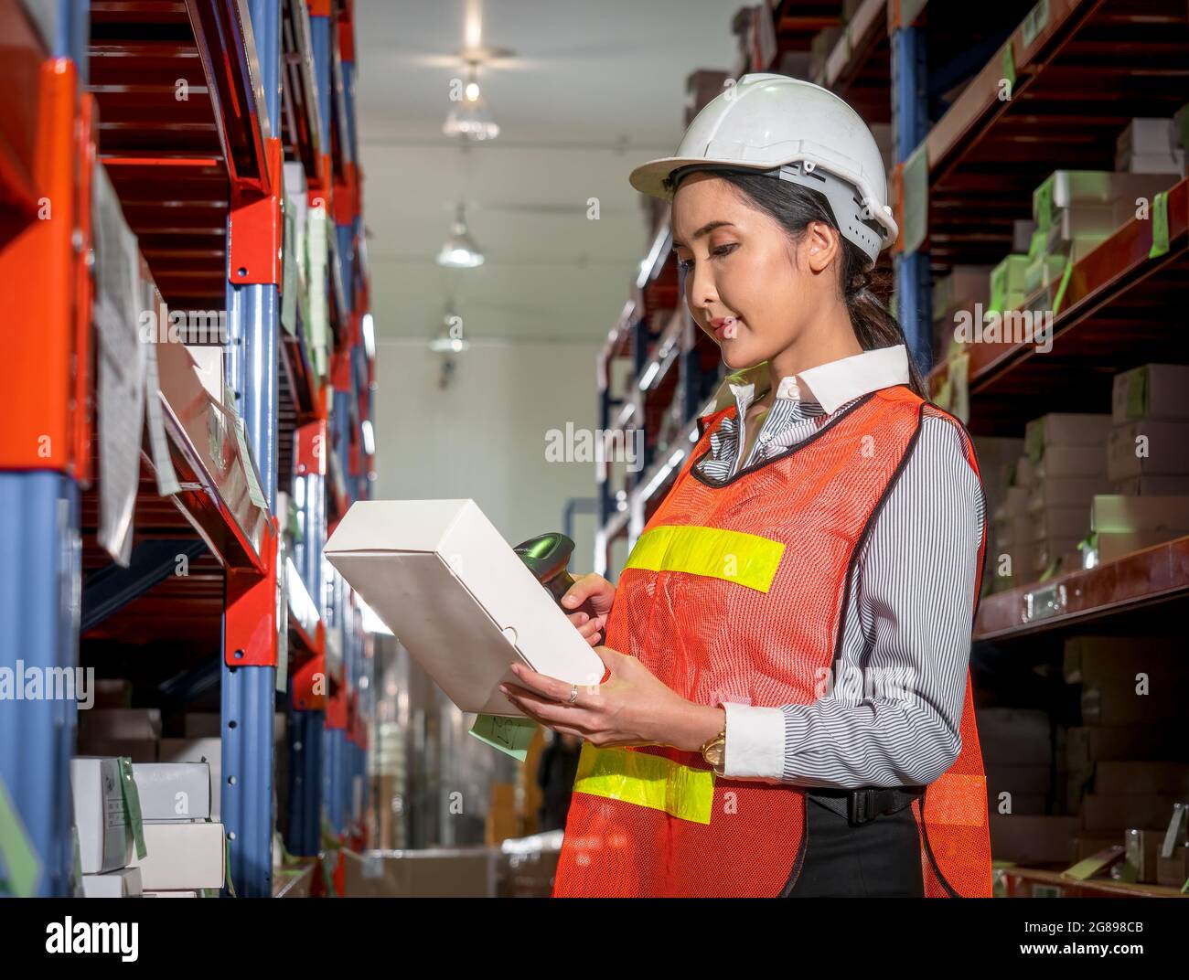 Using laser barcode scanner shelf hi-res stock photography and images ...