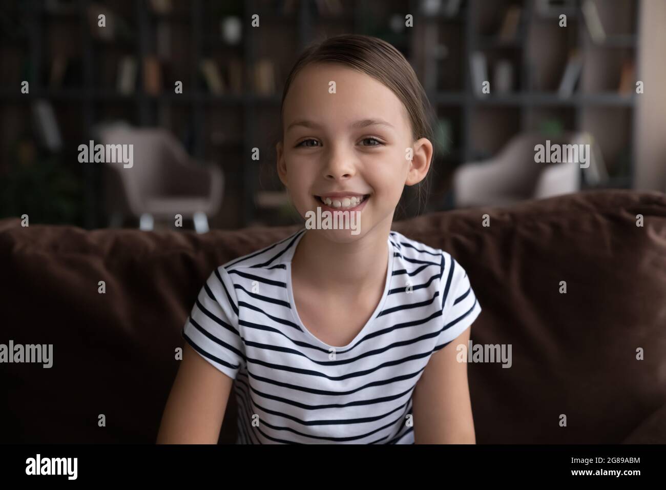 Happy gen Z kid talking at camera during video call Stock Photo - Alamy