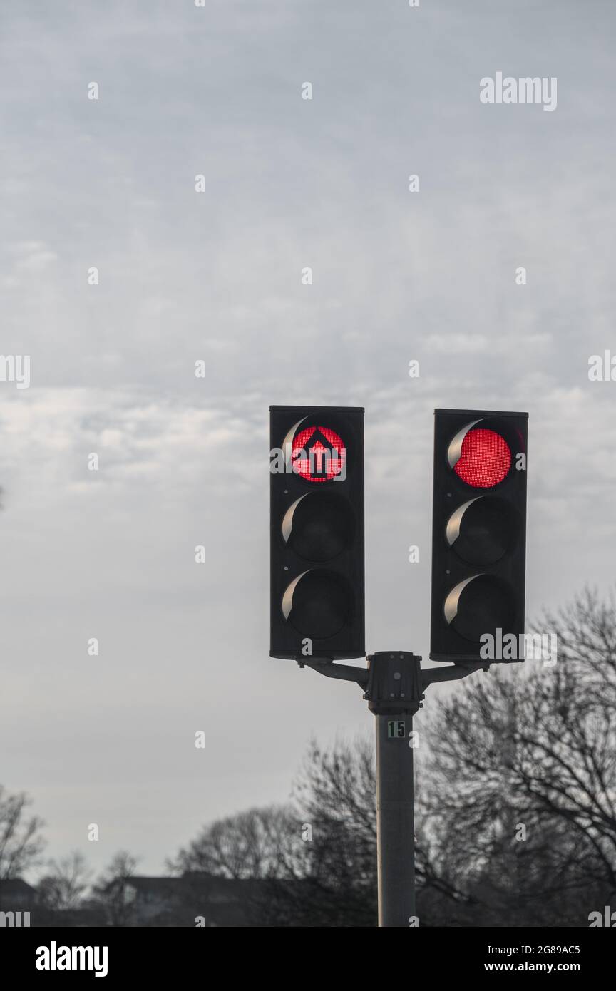 Double red traffic lights with forward-facing arrow concept in Sweden ...