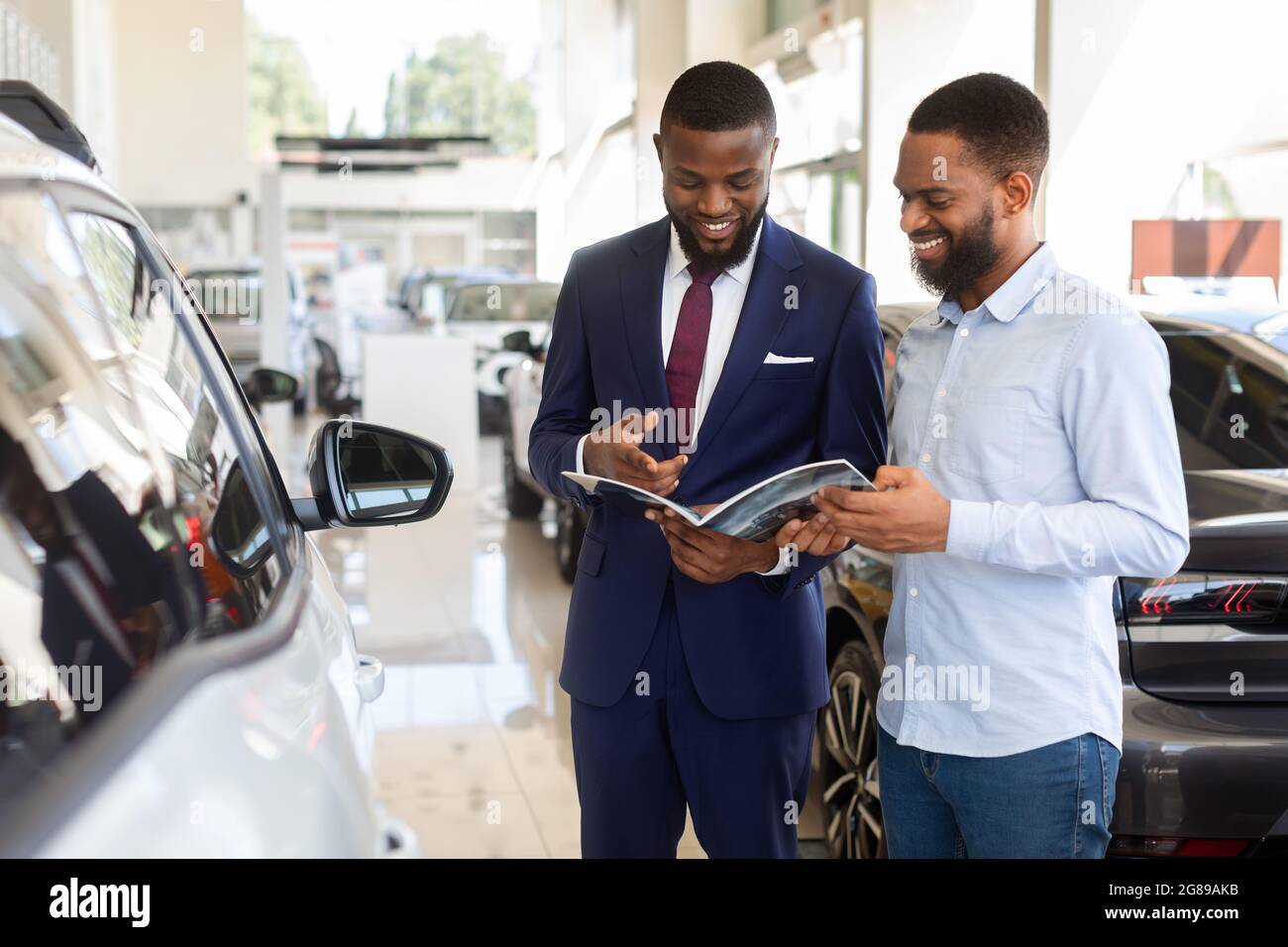A Car Salesman And Customer