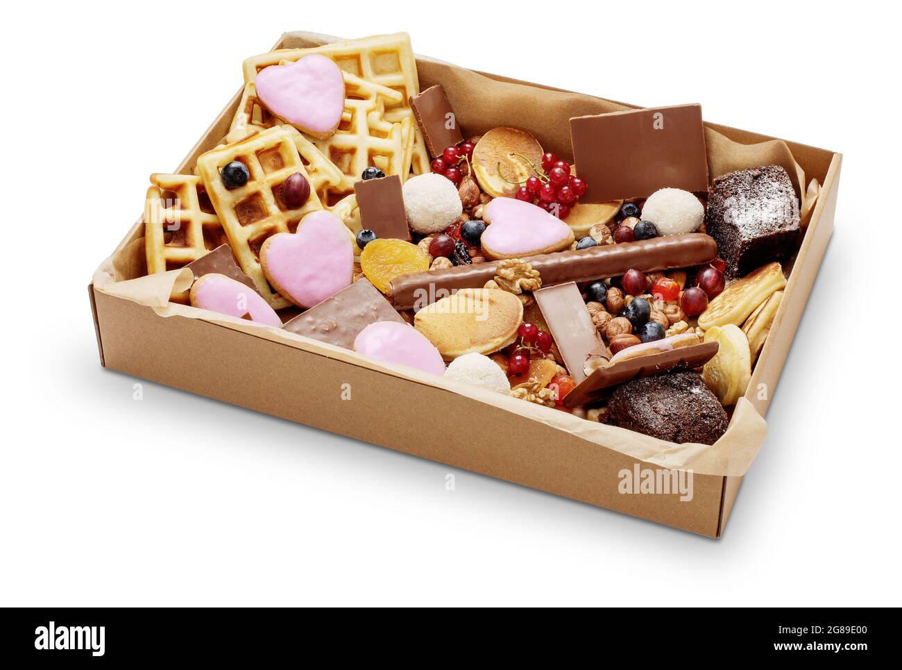 Assortment of sweets, fruits, berries and liver in a box, isolated with ...