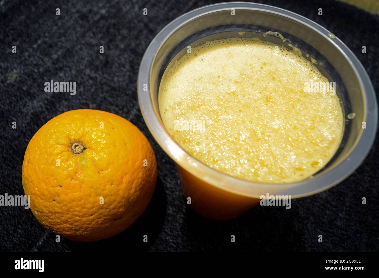 Top view of glass of healthy juice with citrus fruits. Malta fruit ...