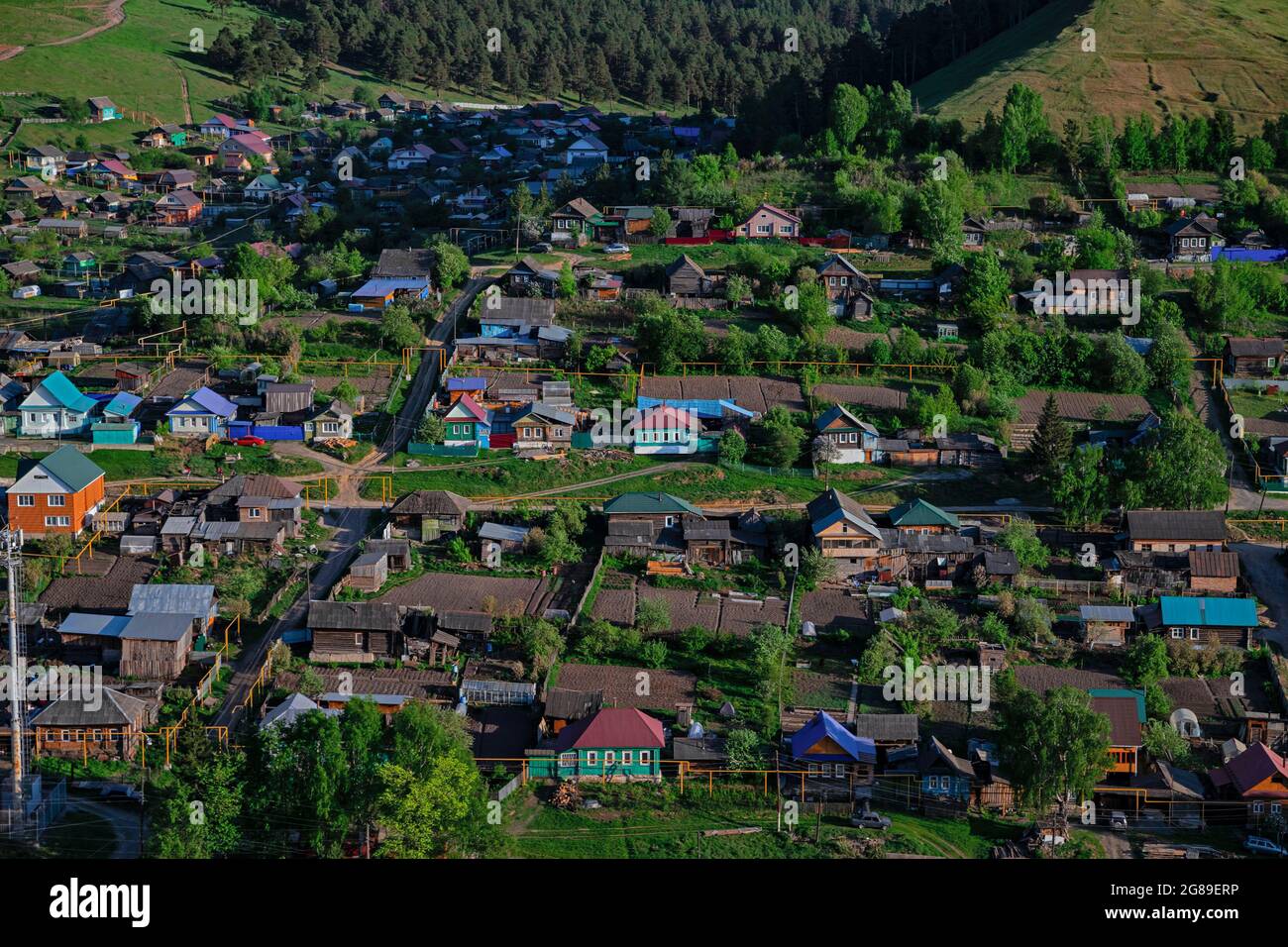 Aerial view of residential rural neighborhood area. House roofs. Russia ...