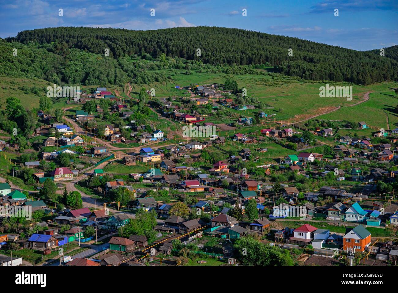 Aerial view of residential rural neighborhood area. House roofs. Russia ...