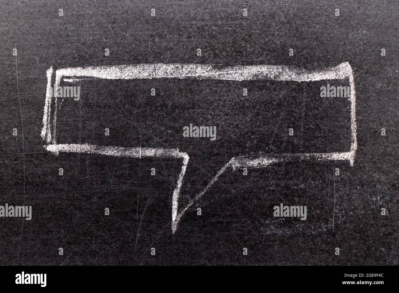 White chalk hand drawing in bubble speech shape with blank space for ...