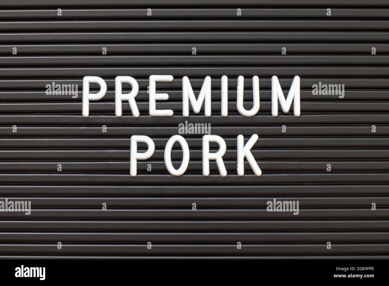 Black color felt letter board with white alphabet in word premium pork ...