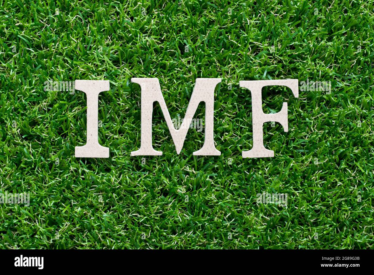 Wood alphabet in word IMF (abbreviation of International Monetary Fund ...