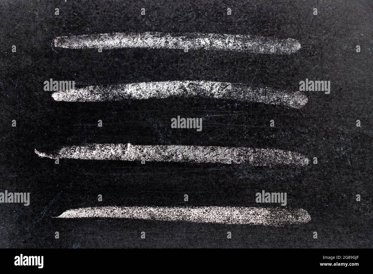 White chalk hand drawing in line shape on black board background Stock ...