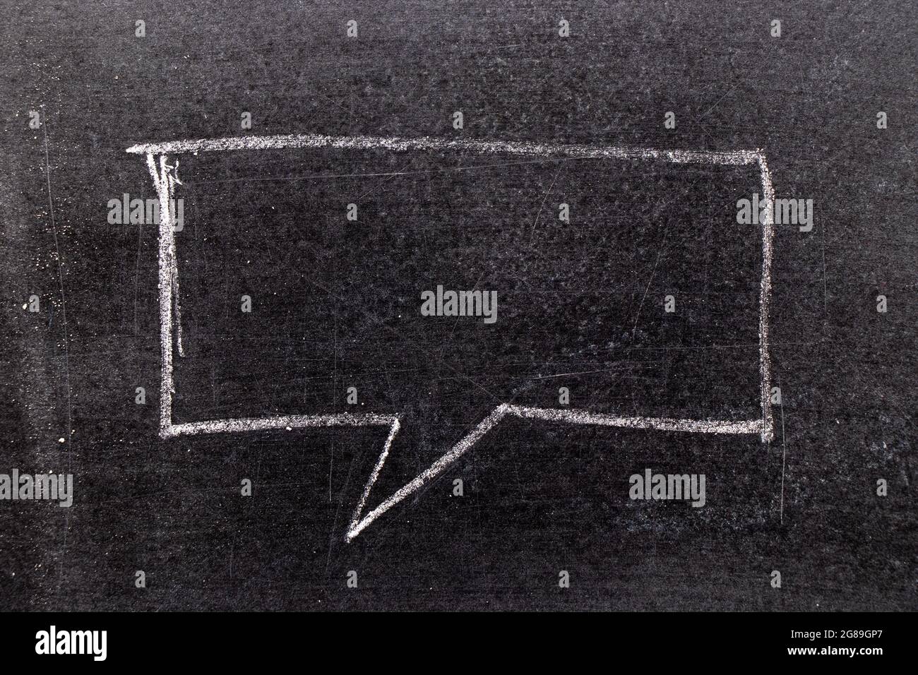 White chalk hand drawing in bubble speech shape with blank space for ...