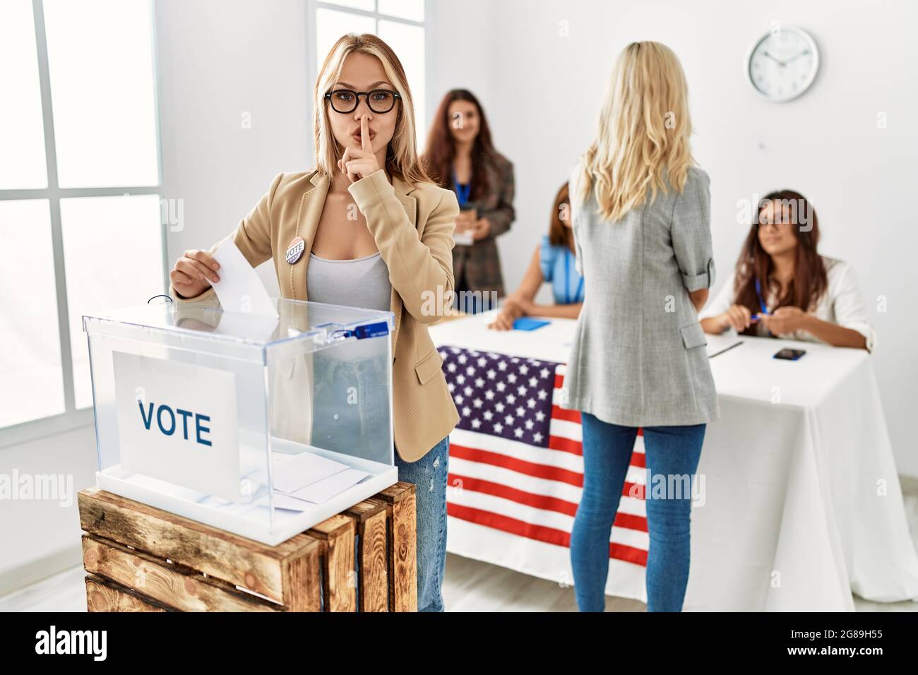 Group of young girls voting at democracy referendum asking to be quiet ...