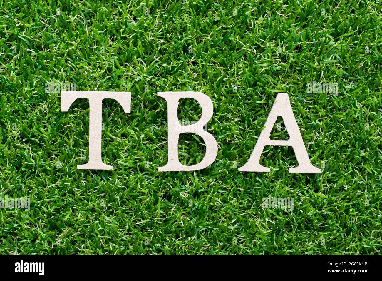 Wood alphabet in word TBA (abbreviation of to be announced) on ...