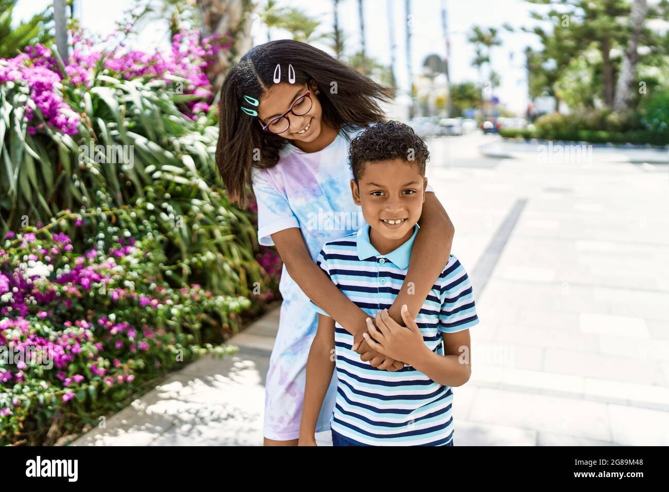 African american brother and sister smiling happy outdoors. Black ...